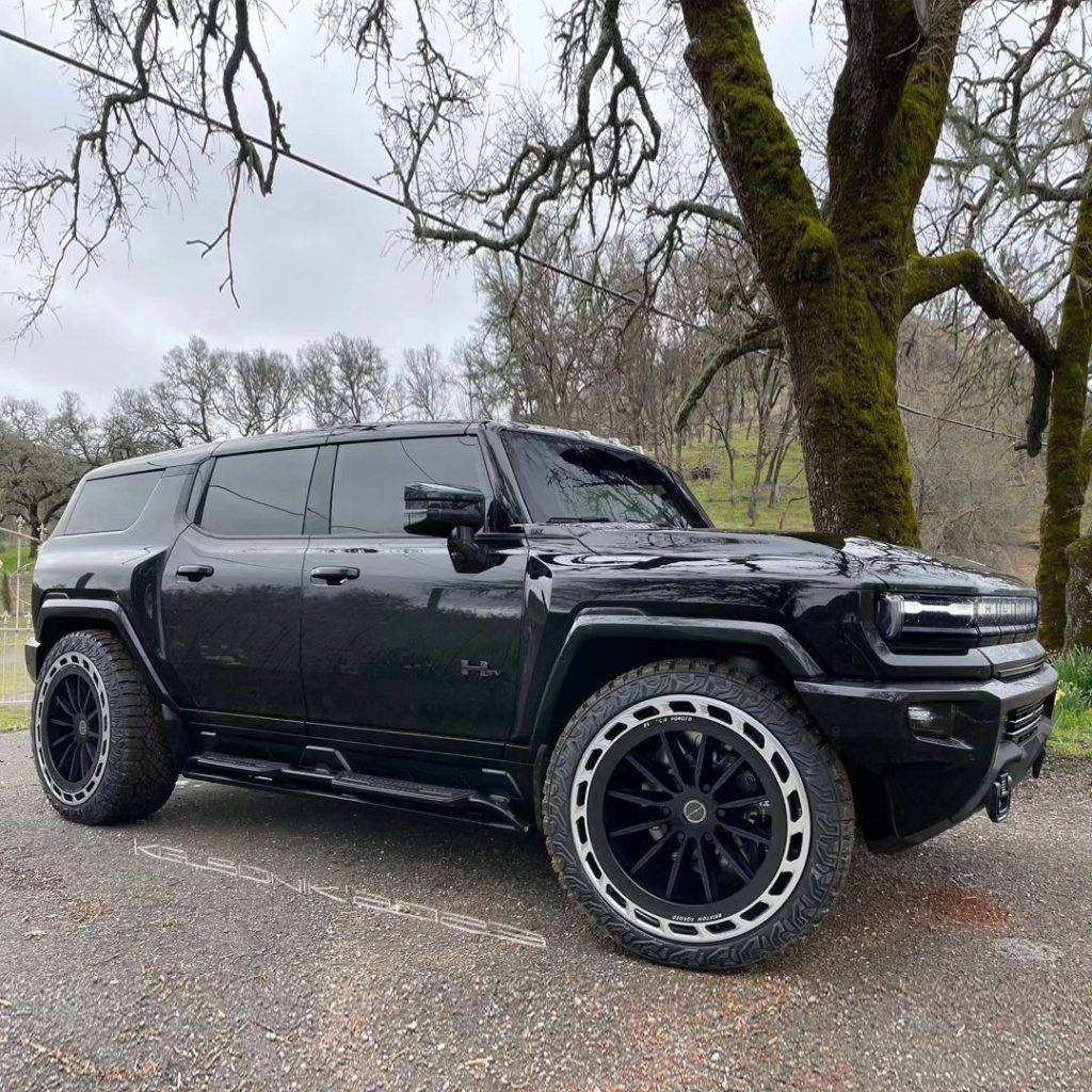 Blacked out GMC Hummer EV on Special Wheels by Kelsonik | Auto Lux